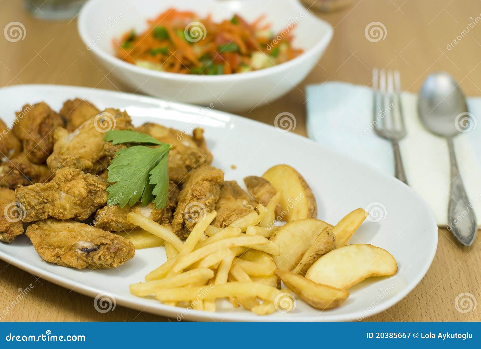 Golden Fried Chicken And Fried Potatoes In A White Stock Image - Image ...