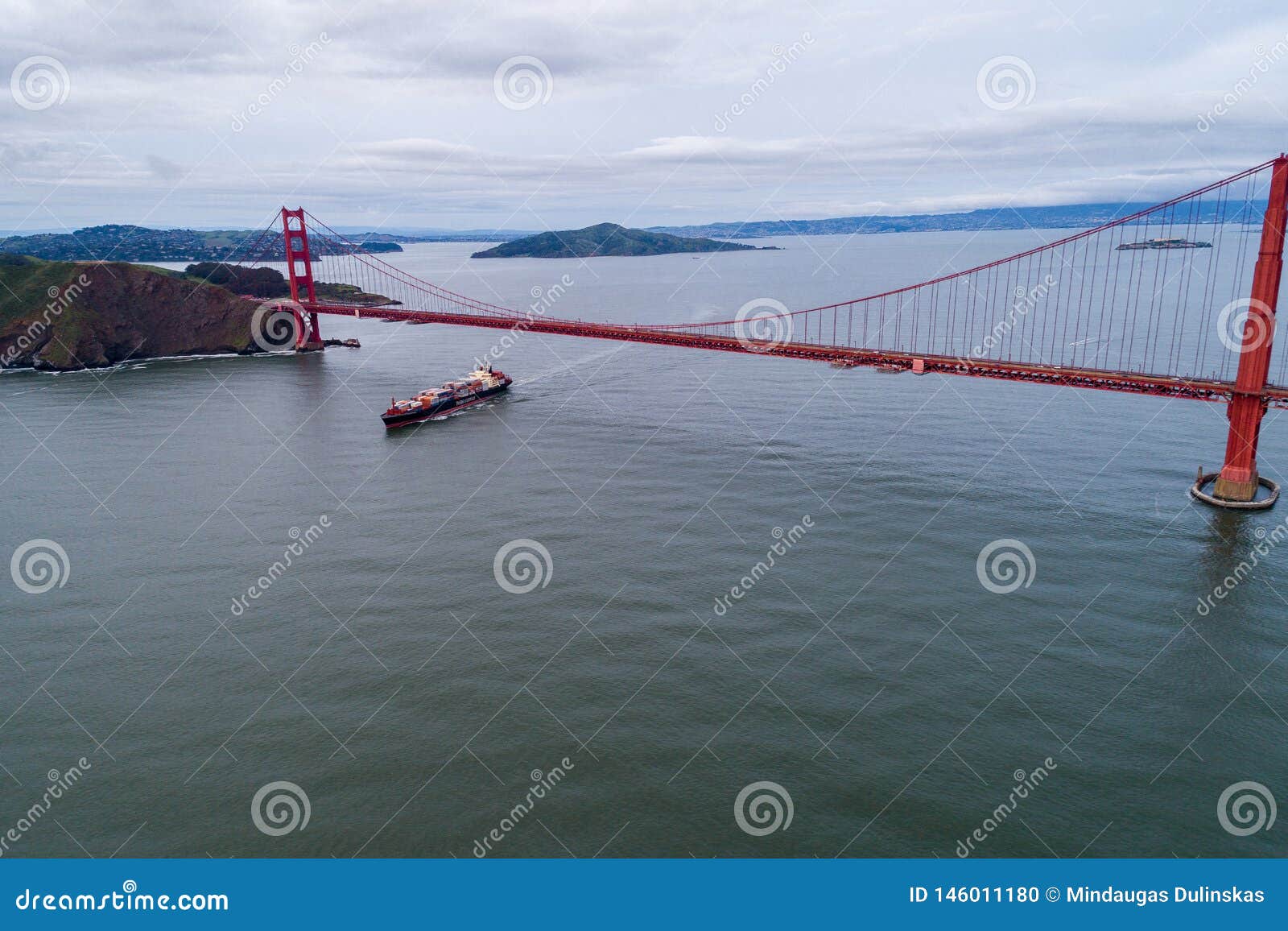 Golden Gate Bridge in San Francisco, California. Container Ship in ...