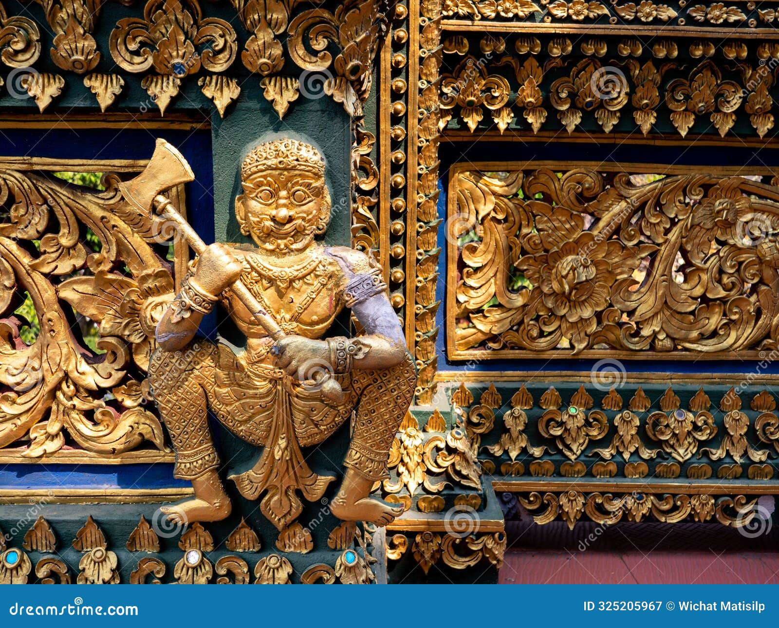 Golden Giant Statue Holding a Axe Sitting Stock Image - Image of ...