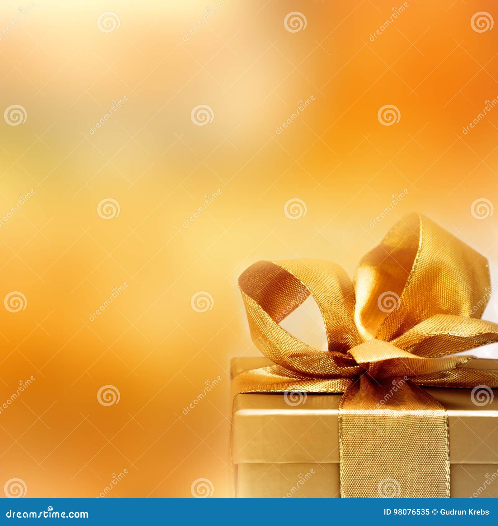 Golden Gift with a Loop and a Christmas Background Stock Image - Image ...