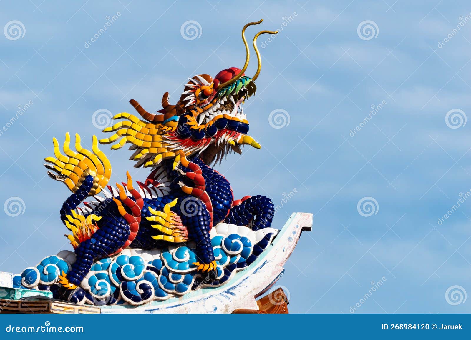 Golden Gragon Statue on Red Pillar in the Shrine with Blue Sky. Stock ...