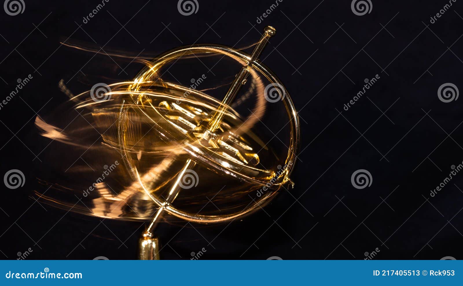Golden Gyroscope Spinning Wildly on Its Base Stock Image - Image of ...