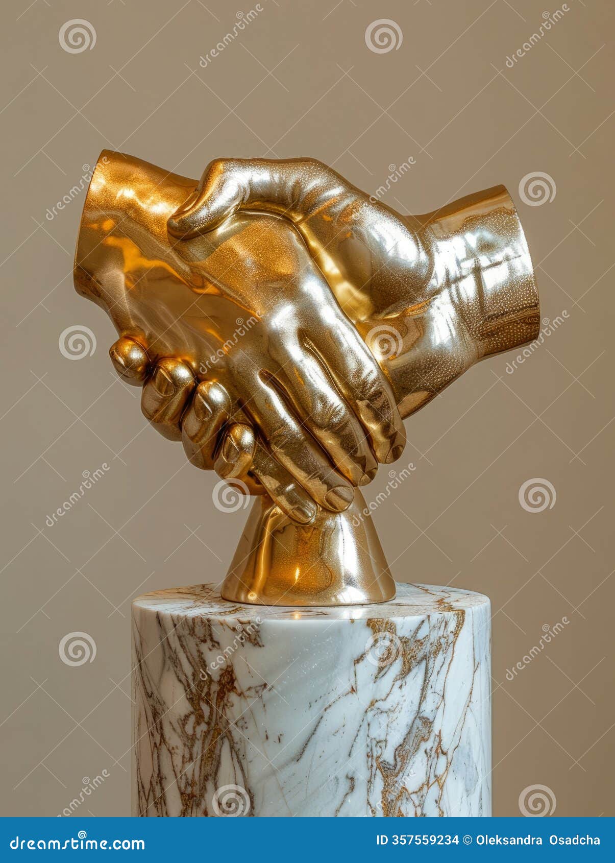 Golden Handshake Sculpture on a Marble Base. Stock Photo - Image of ...