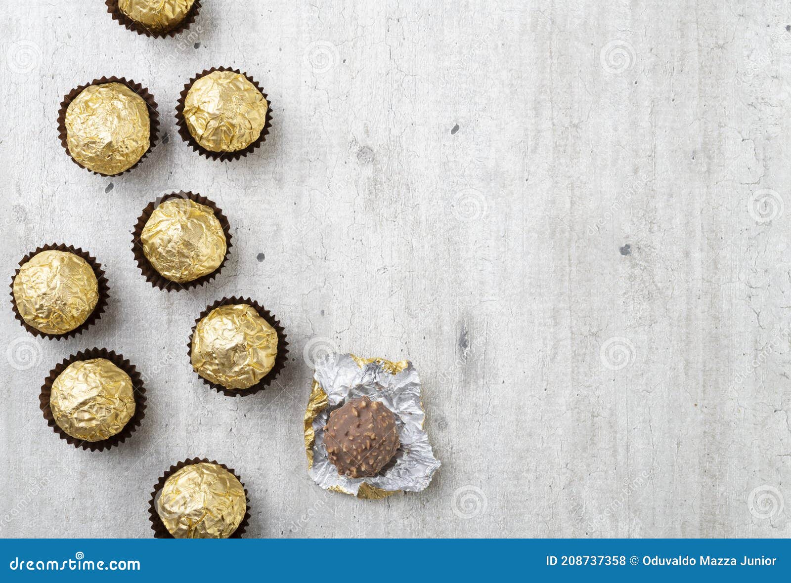 Golden Hazelnut Filled Chocolates with Copy Space Stock Photo - Image ...