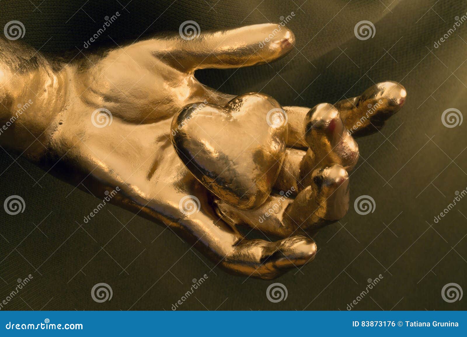 Golden Heart in the Golden Hand Stock Photo - Image of graphic, shape ...
