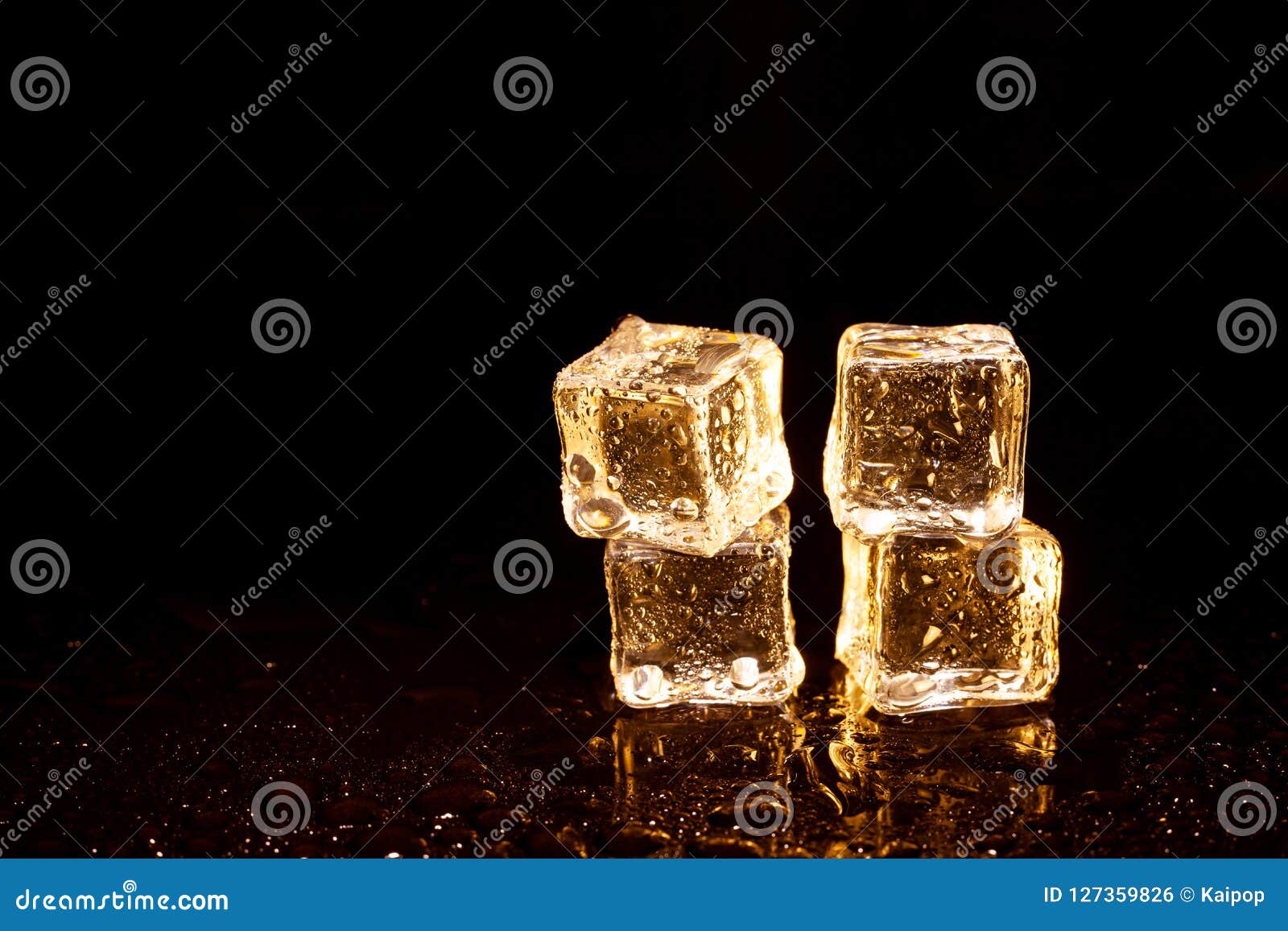 Golden ice cubes. stock photo. Image of glass, cognac - 127359826