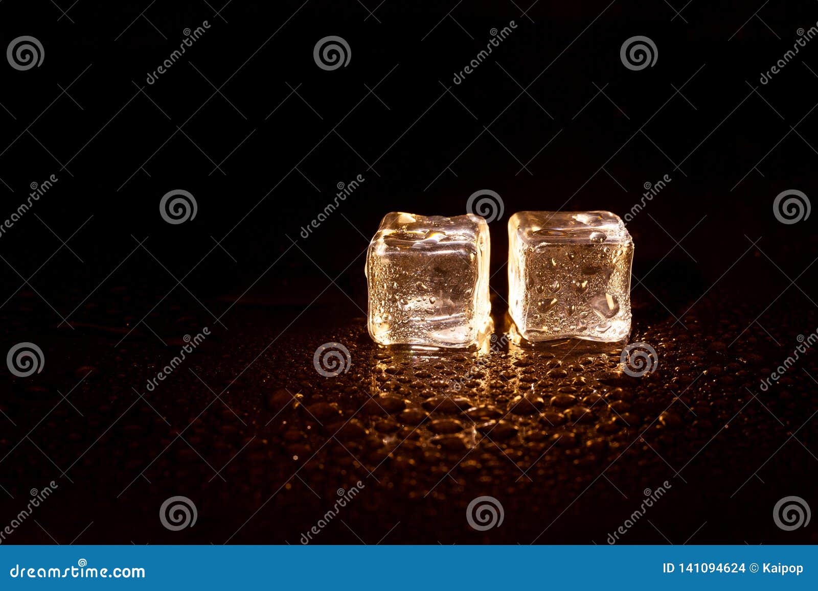 Golden Ice Cubes on Black Background Stock Photo - Image of closeup ...