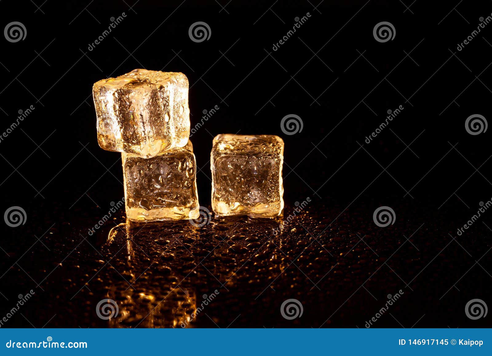 Golden Ice Cubes on Black Background Stock Image - Image of cold ...