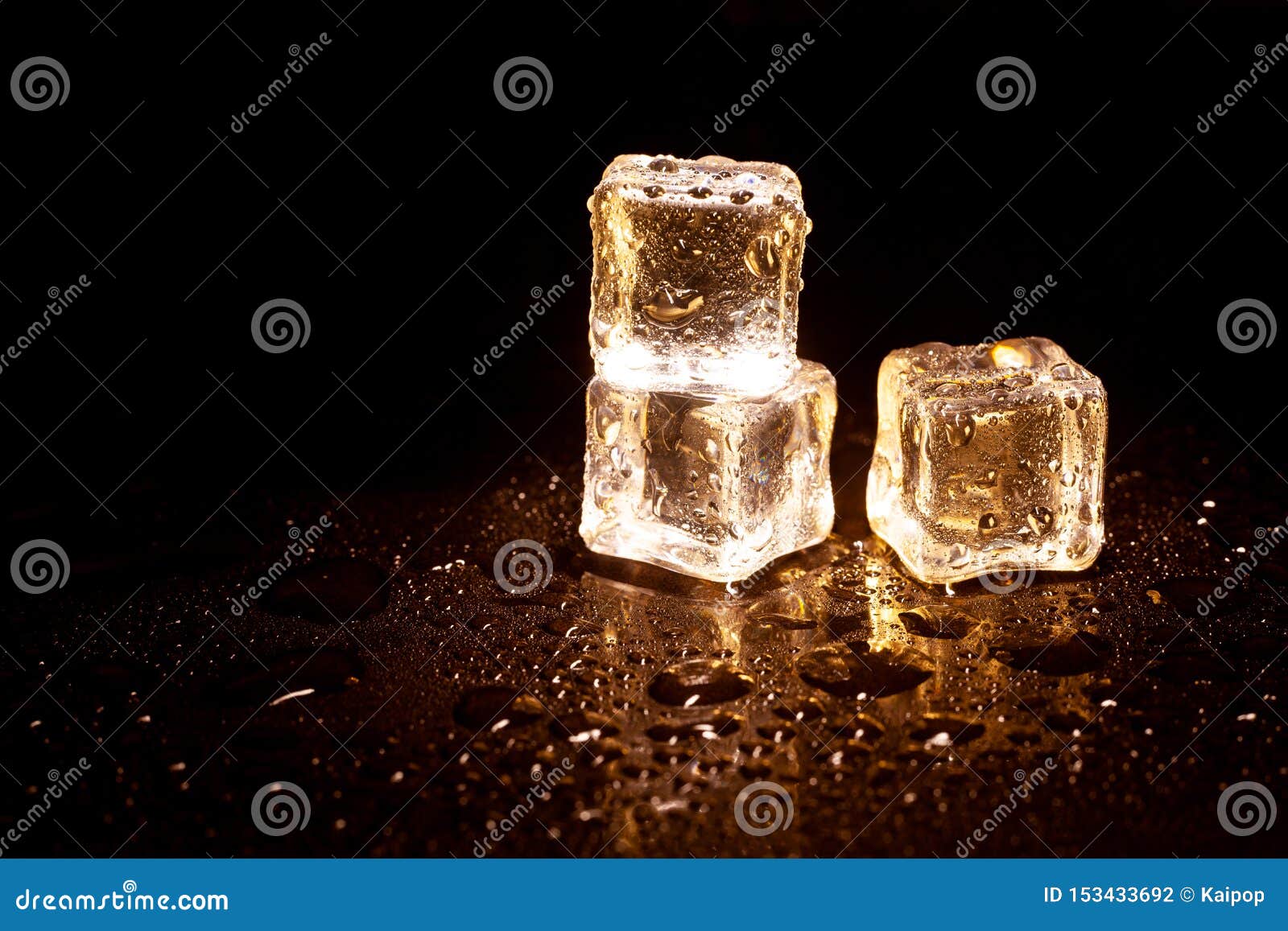 Golden Ice Cubes on Black Background Stock Photo - Image of black ...
