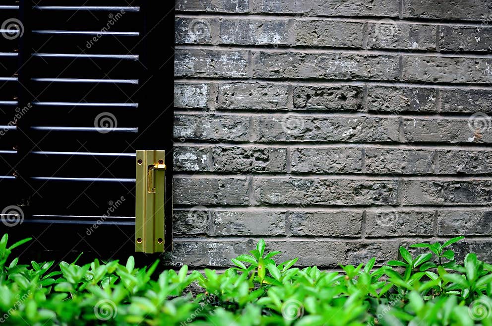 Golden Latch on Black Window Stock Image - Image of latch, metallic ...