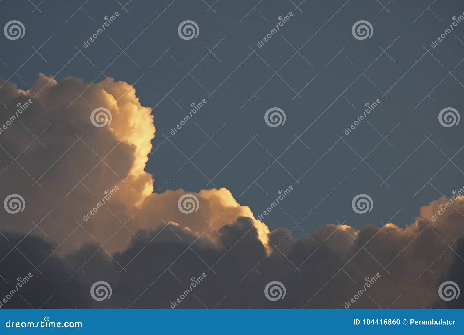 GOLDEN LIGHT FALLING on CUMULUS CLOUD Stock Photo - Image of golden ...