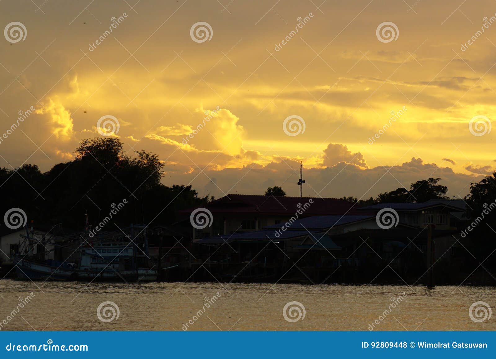 Golden Light of Sunset an Evening by the River, Thailand. Stock Photo ...