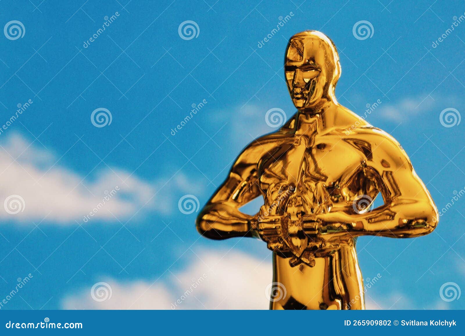 Golden Man Statue on Blue Sky Background Stock Photo - Image of golden ...