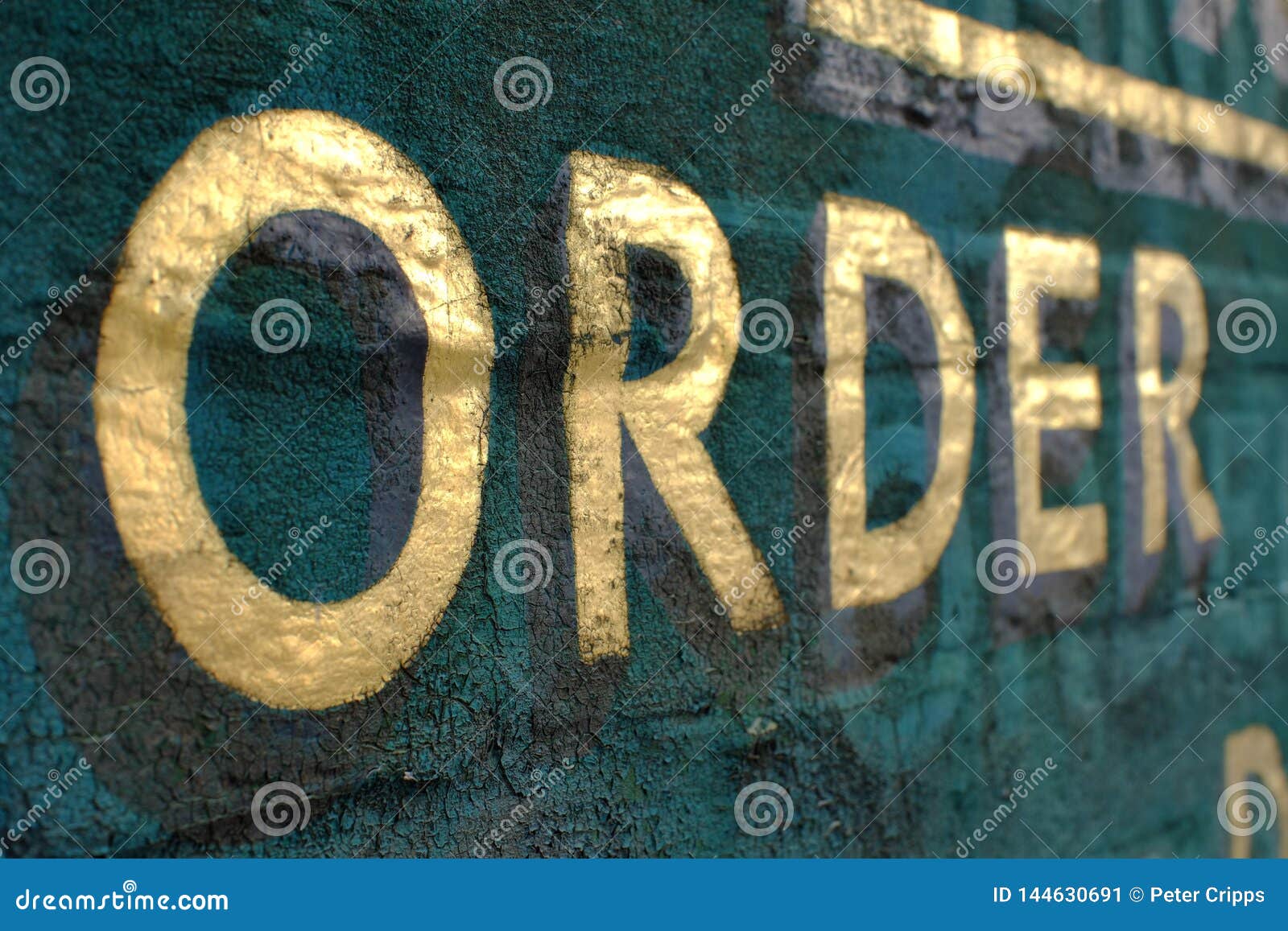 Golden order stock image. Image of brick, order, paint - 144630691
