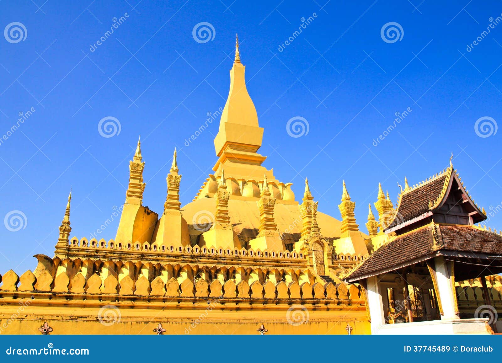 Golden Pagada in Wat Pha that Luang Stock Image - Image of yellow ...