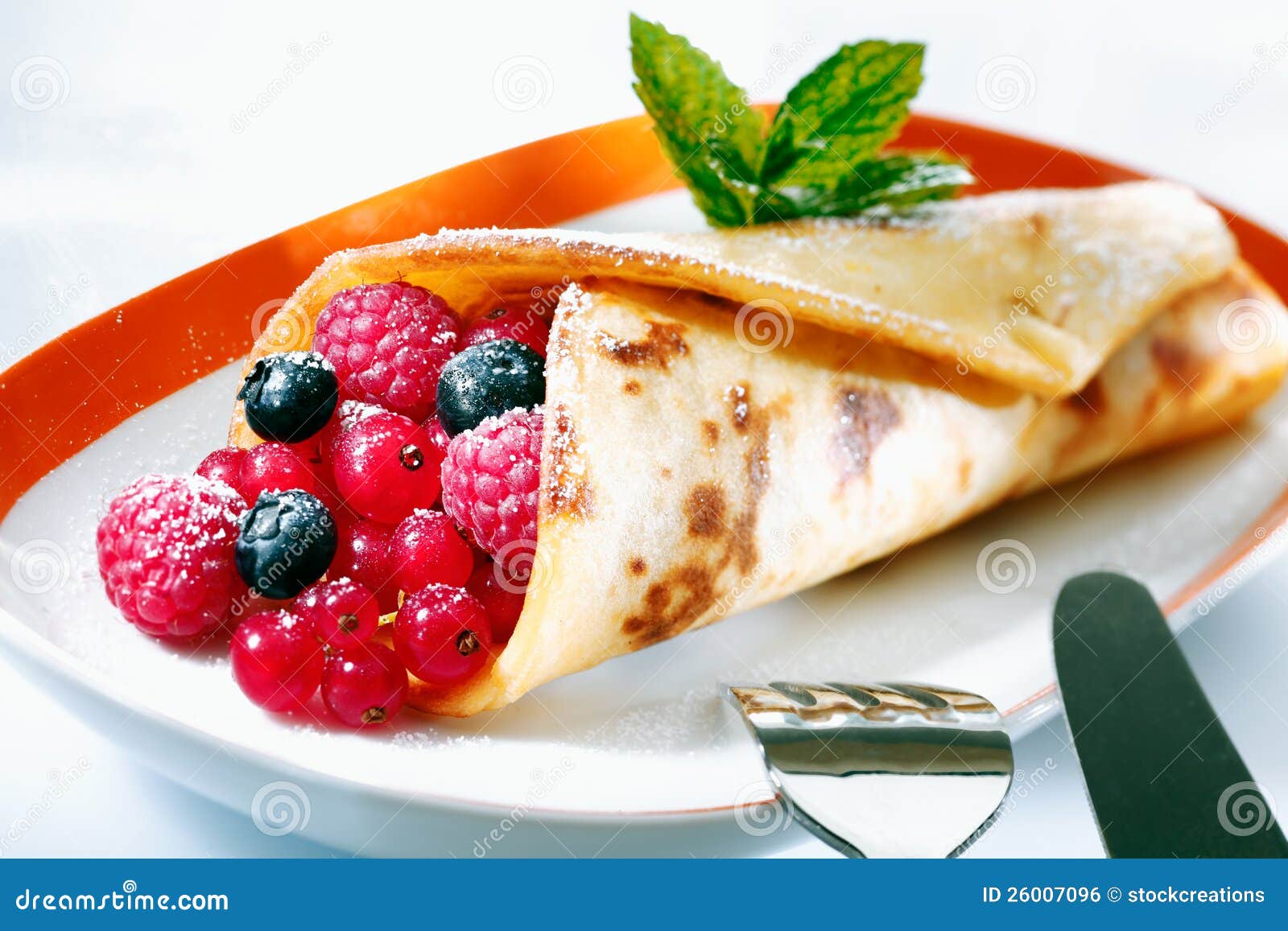 Golden Pancake Filled with Berries Stock Photo - Image of closeup ...