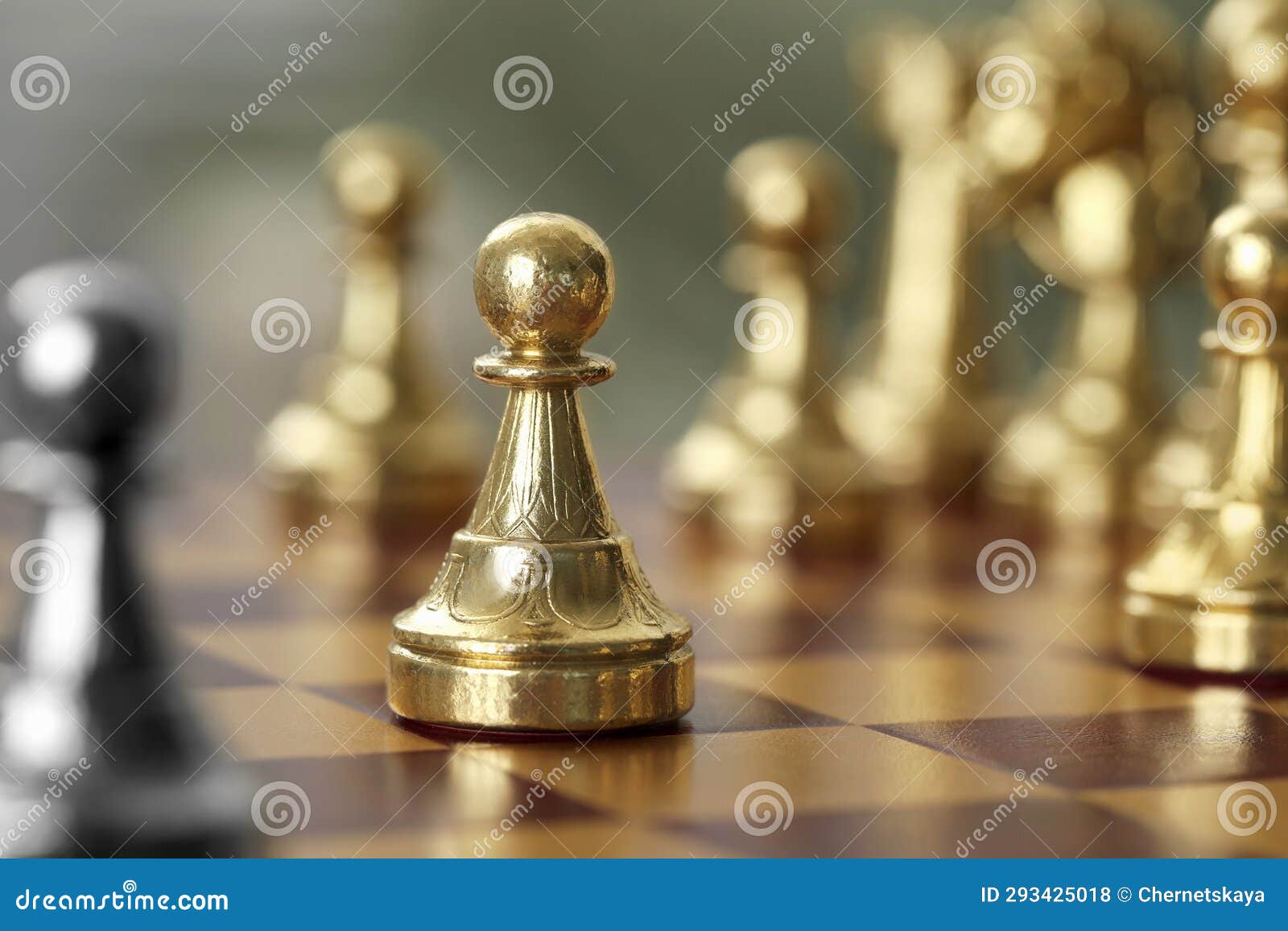 The Golden Pawn Chess Piece Standing Out From The Group Of Silver Pawn ...