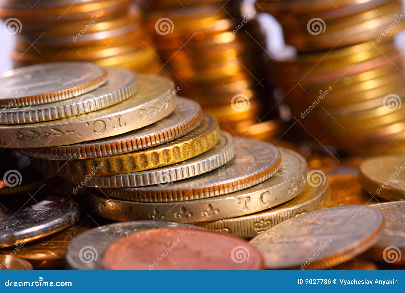 Golden piles of coins stock photo. Image of metal, deposit - 9027786