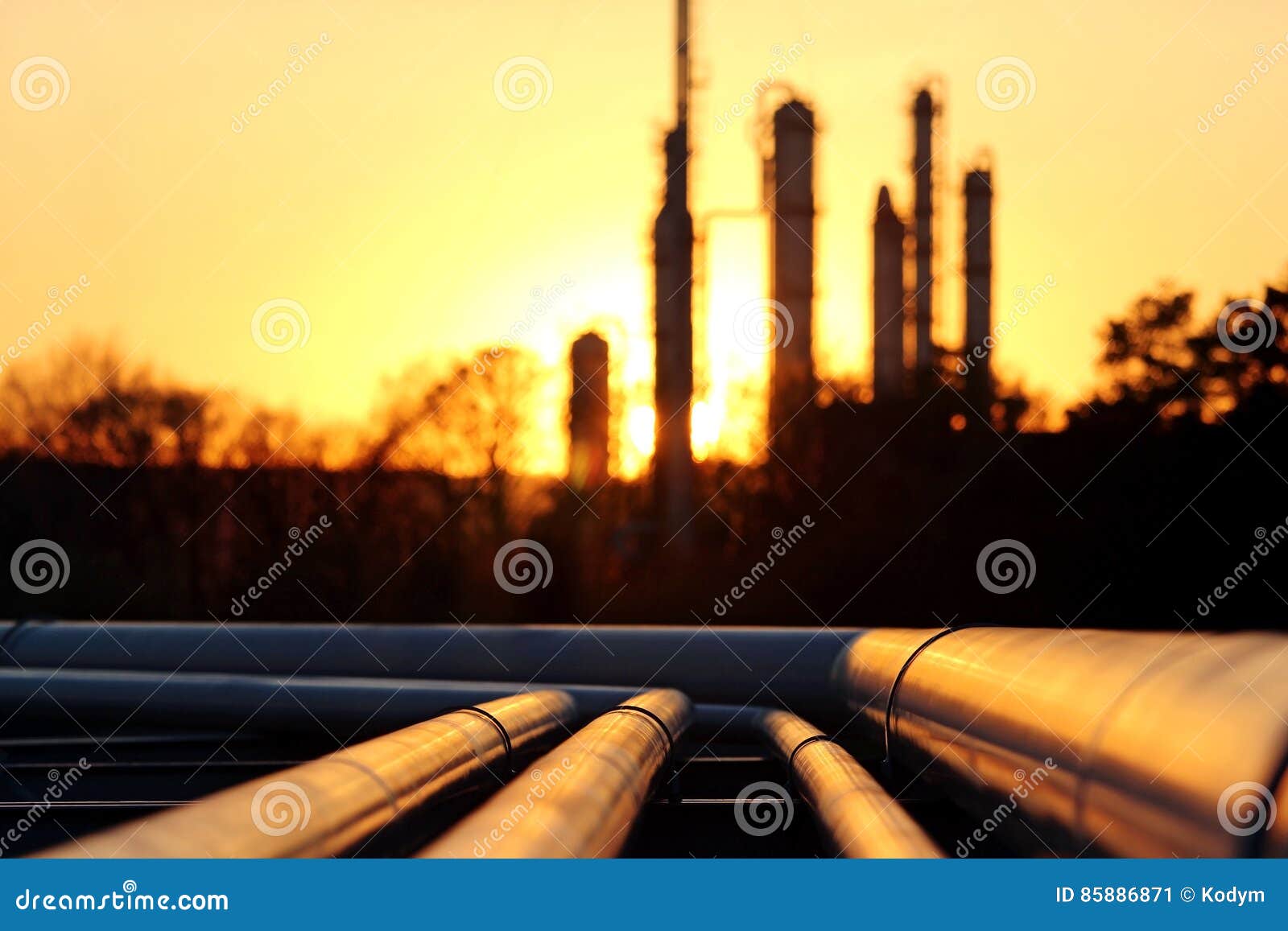 Golden Pipe System Against the Sun in Oil Crude Refinery Stock Image ...