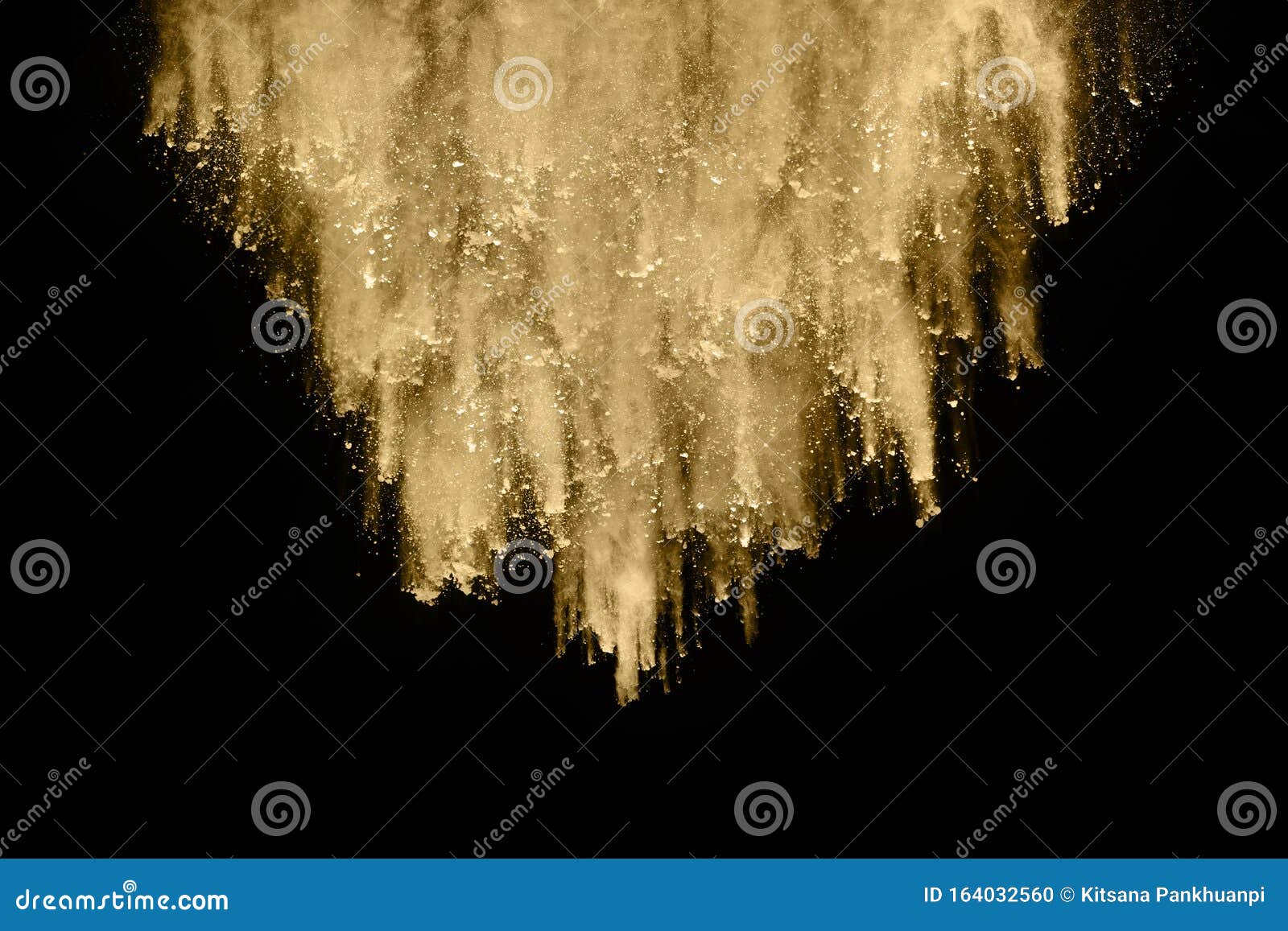 Golden Powder Explosion on Black Background. Stock Photo - Image of ...