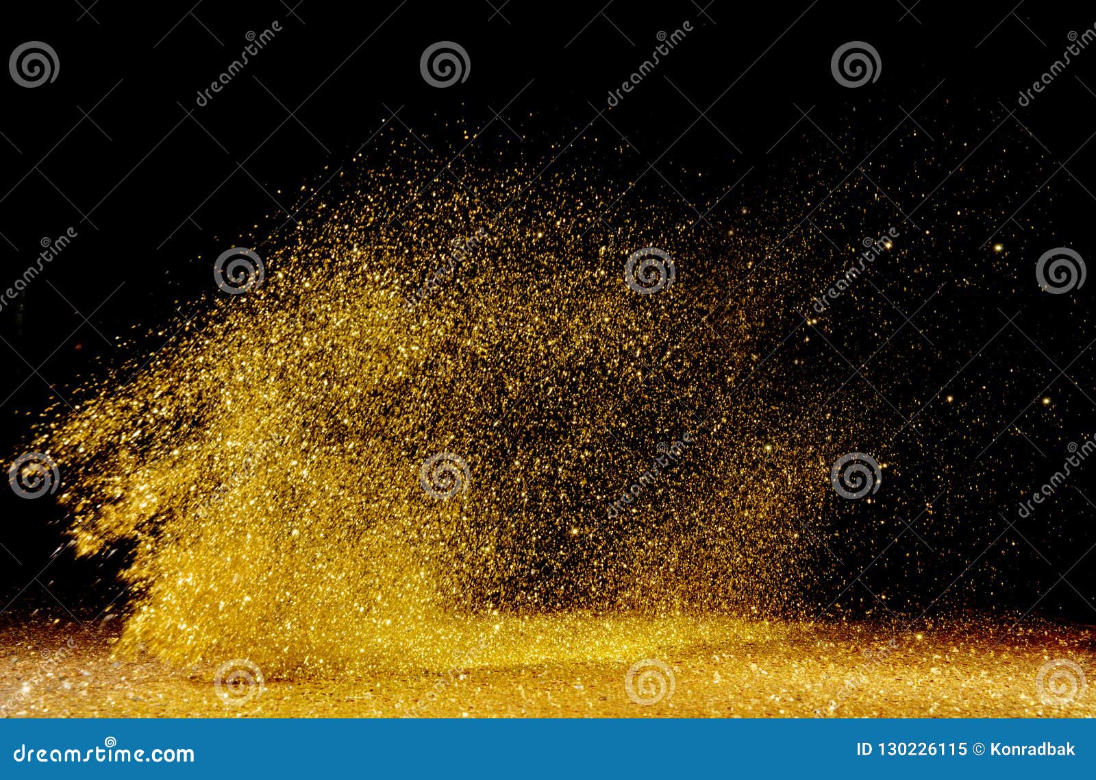 Golden Powder Scattered Over the Dark Background Stock Image - Image of ...