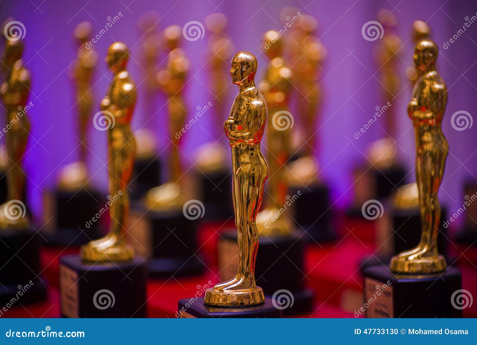 Golden Prize Statues editorial image. Image of glowing - 47733130