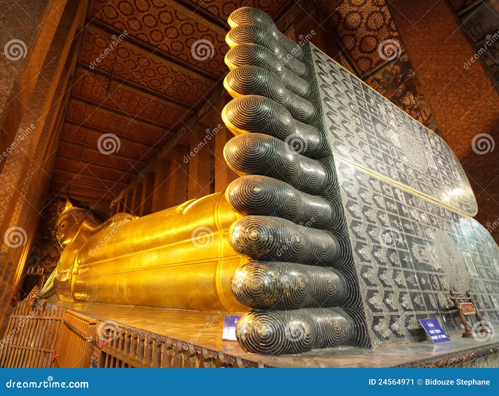 Golden reclining buddha stock image. Image of foot, buddhism - 24564971