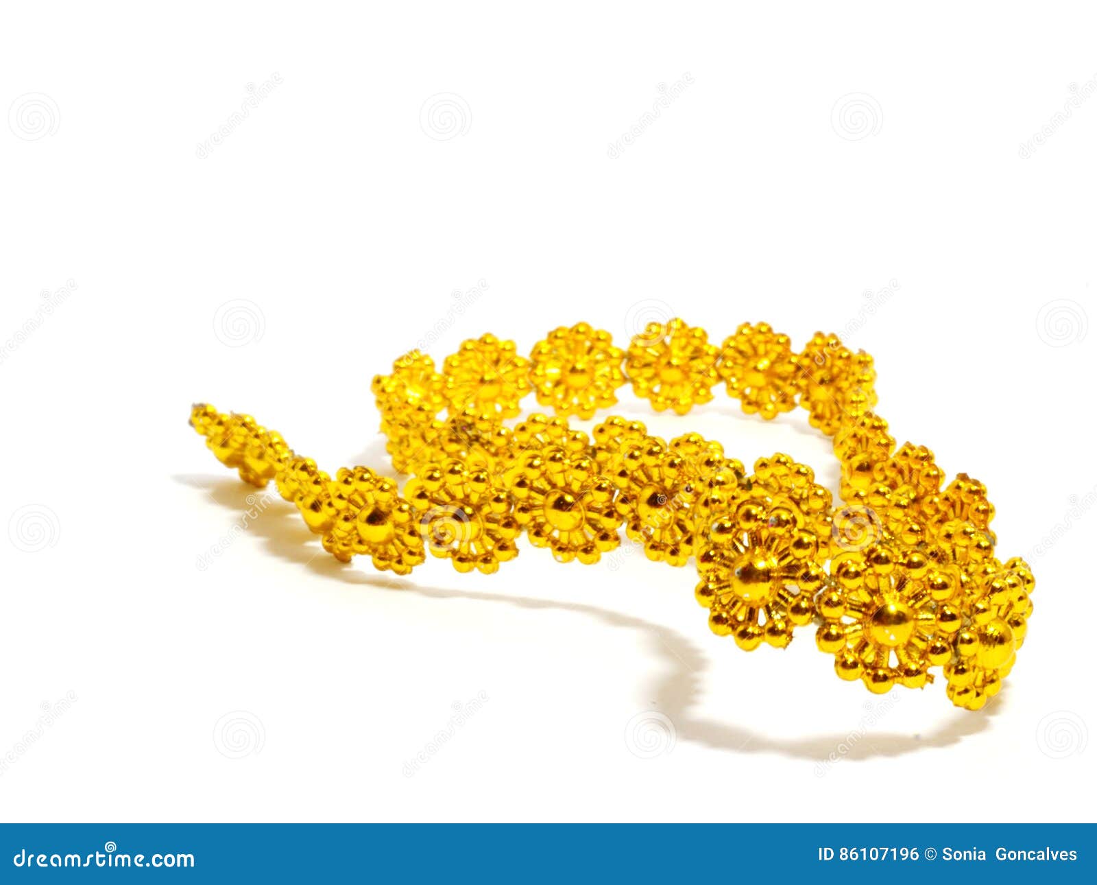 Golden ribbon with flowers stock photo. Image of gold - 86107196