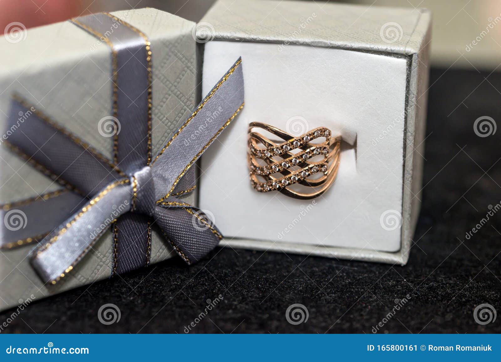 Golden Ring with Diamond in Box Isolated on Black Stock Image - Image ...
