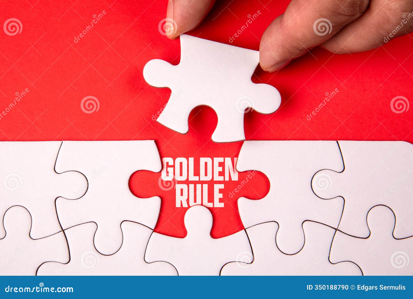 Golden Rule. White Puzzle Pieces on an Red Background Stock Photo ...