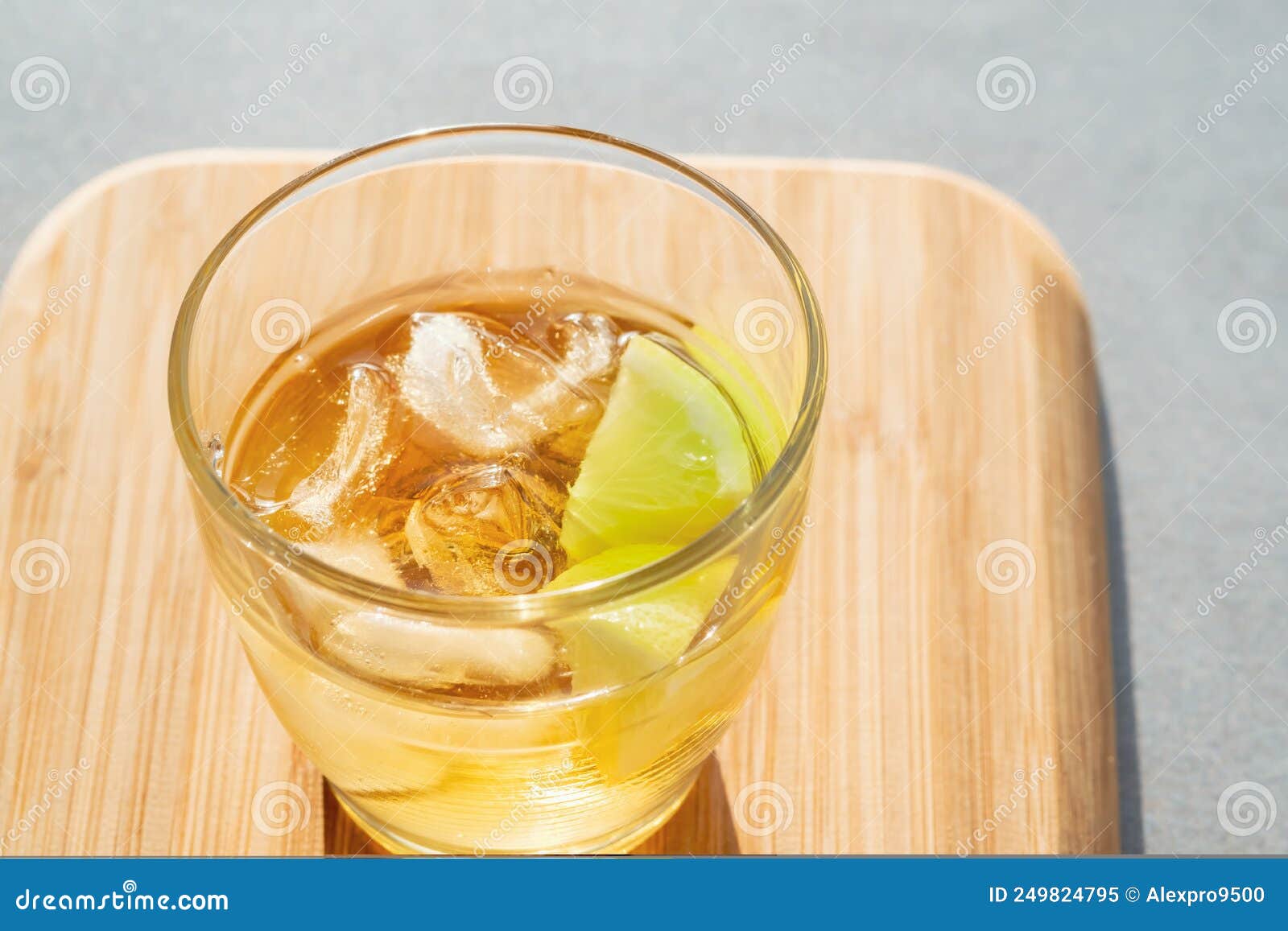 Golden rum on the rocks stock image. Image of gold, brown - 249824795