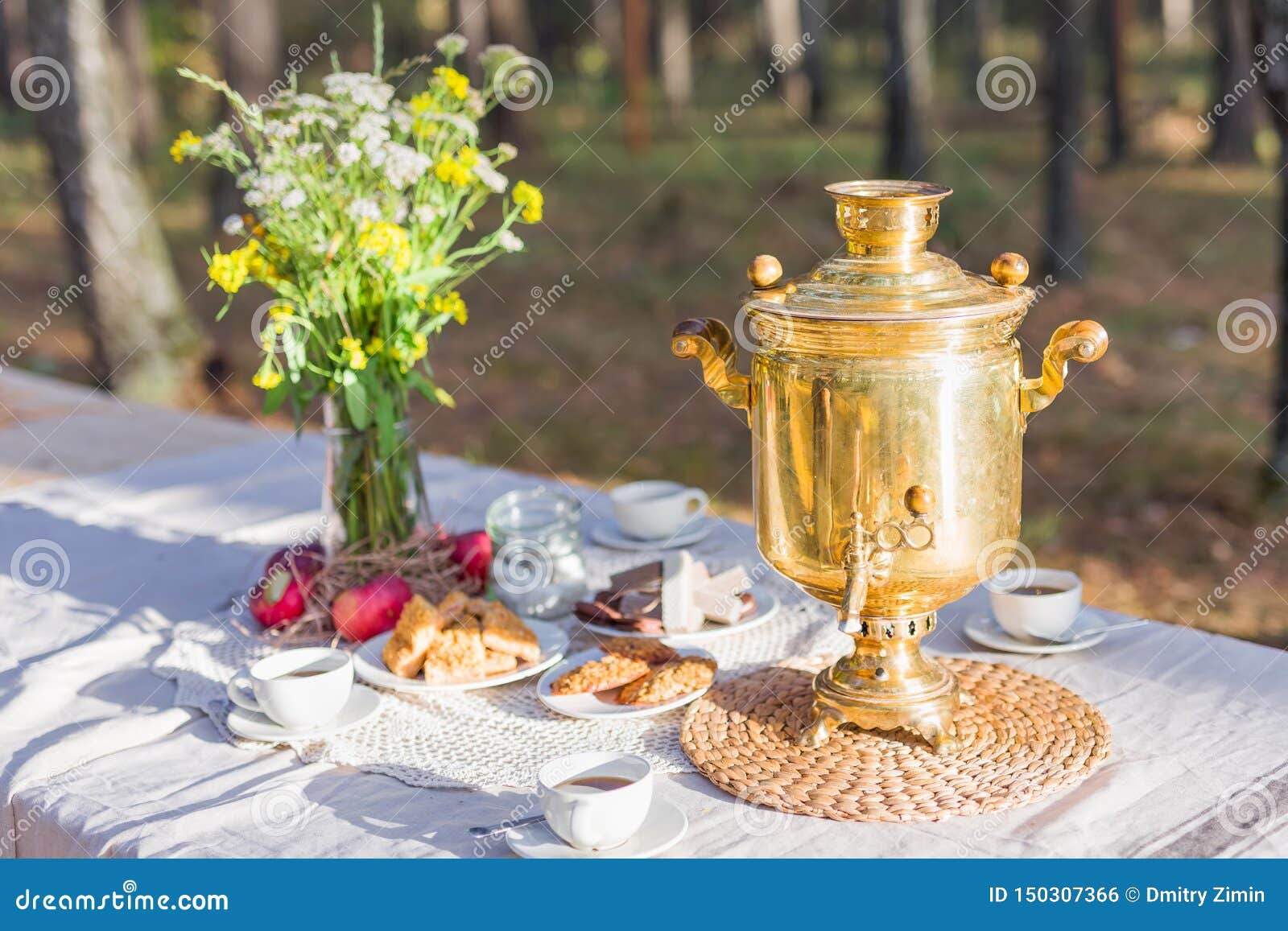 Golden Russian Samovar with Tea Cups, Snacks on Table Decorated with ...
