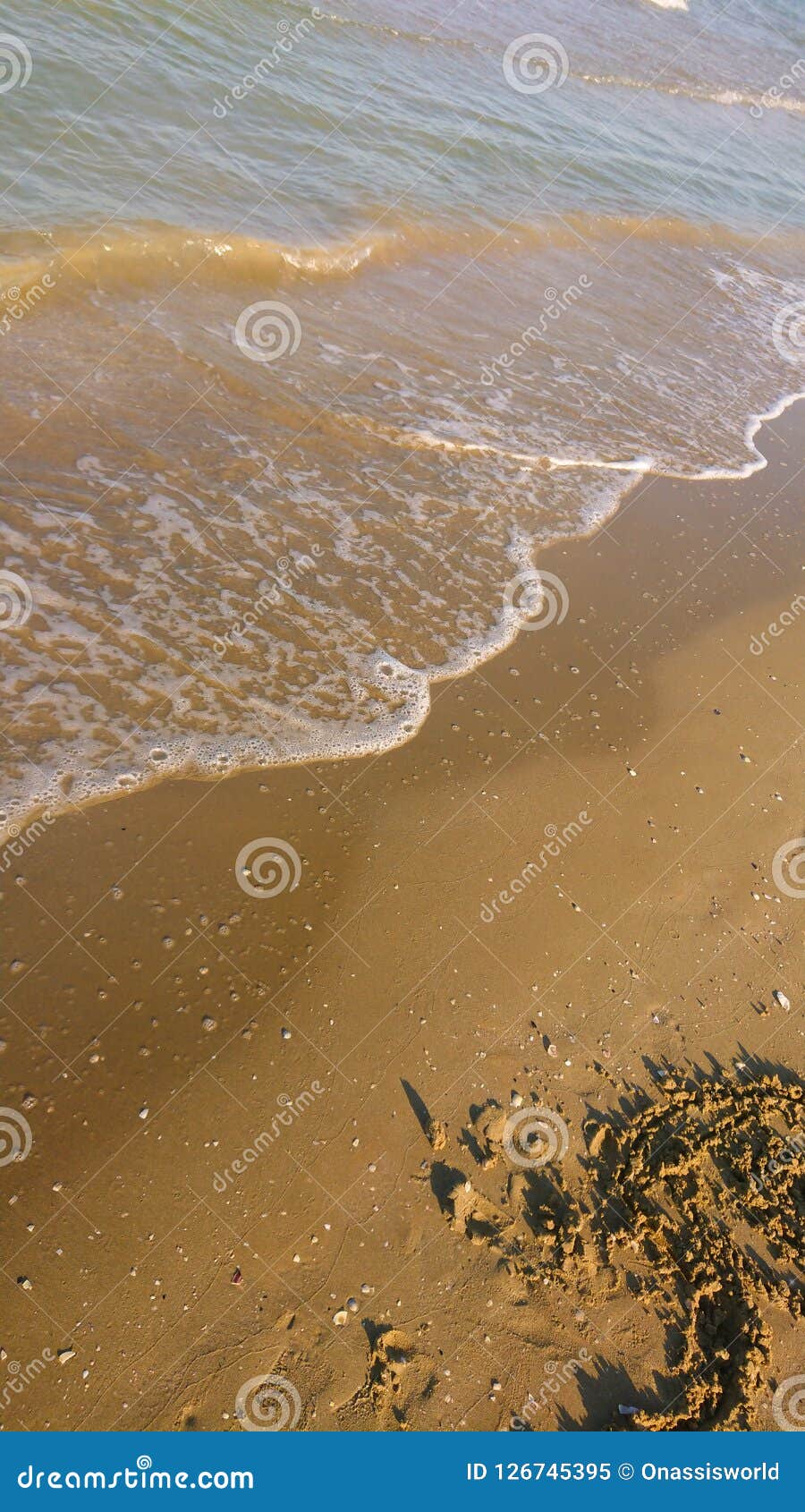 Beach and waves stock image. Image of beach, shallow - 126745395