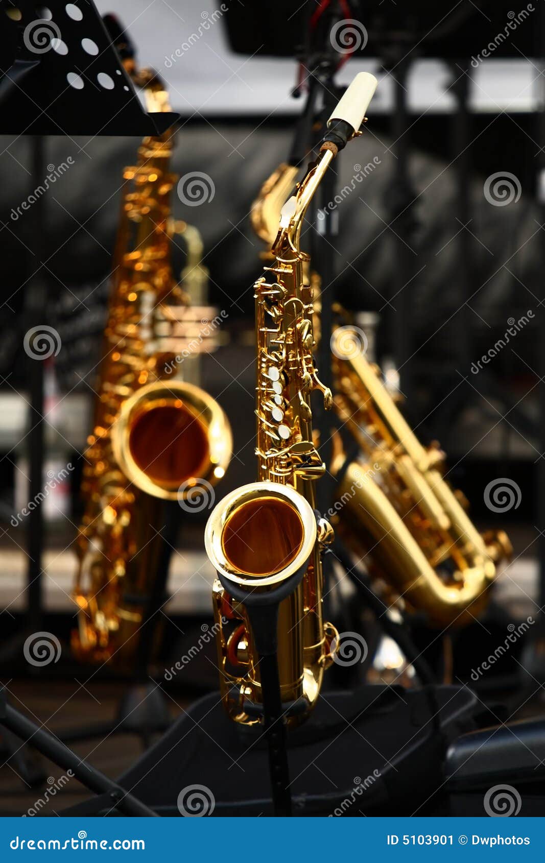 Golden saxophones stock image. Image of brass, gold, play - 5103901