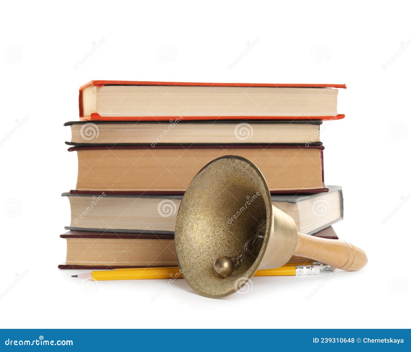 Golden School Bell with Wooden Handle, Pencils and Stack of Books on ...