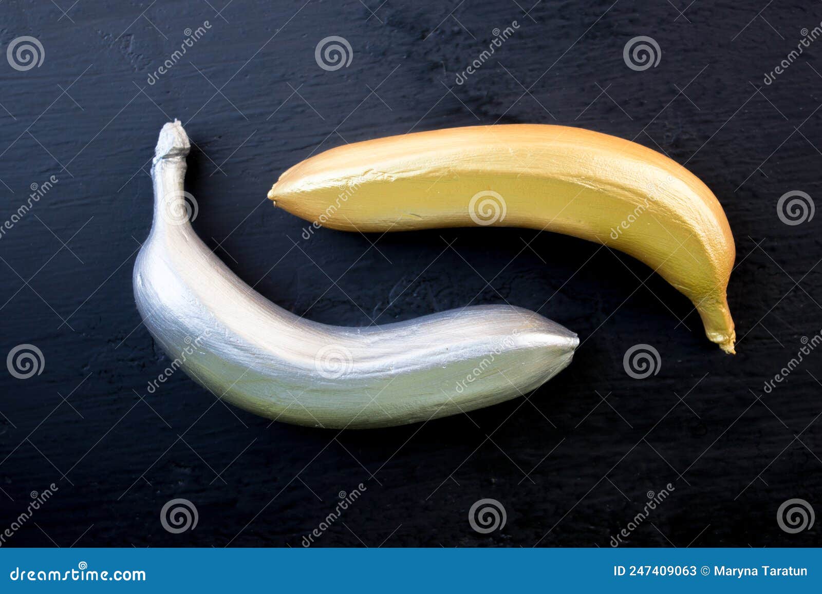 Golden and Silver Banana on a Black Background. Trend Concept ...