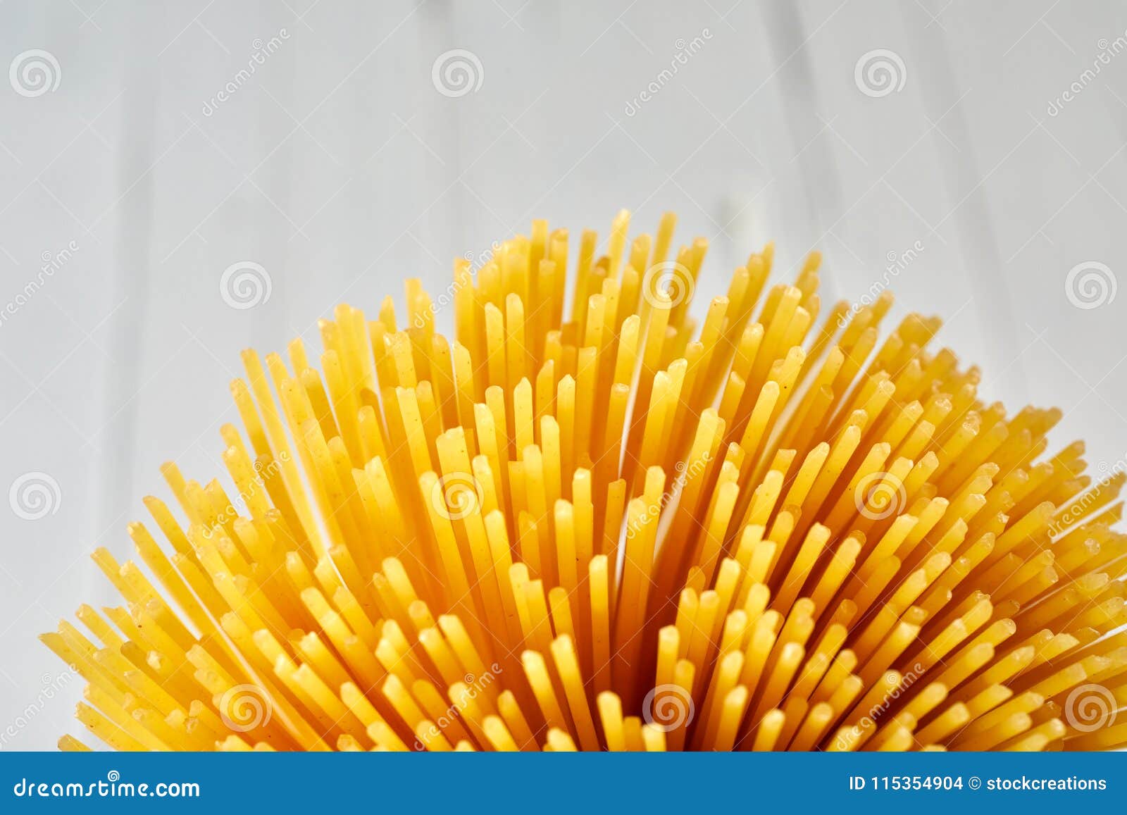 Golden Spaghetti Bundle Close Up with Copy Space Stock Photo - Image of ...