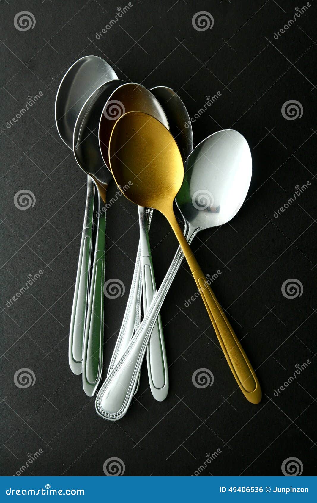 Golden Spoon among Ordinary Spoons Stock Photo - Image of financial ...