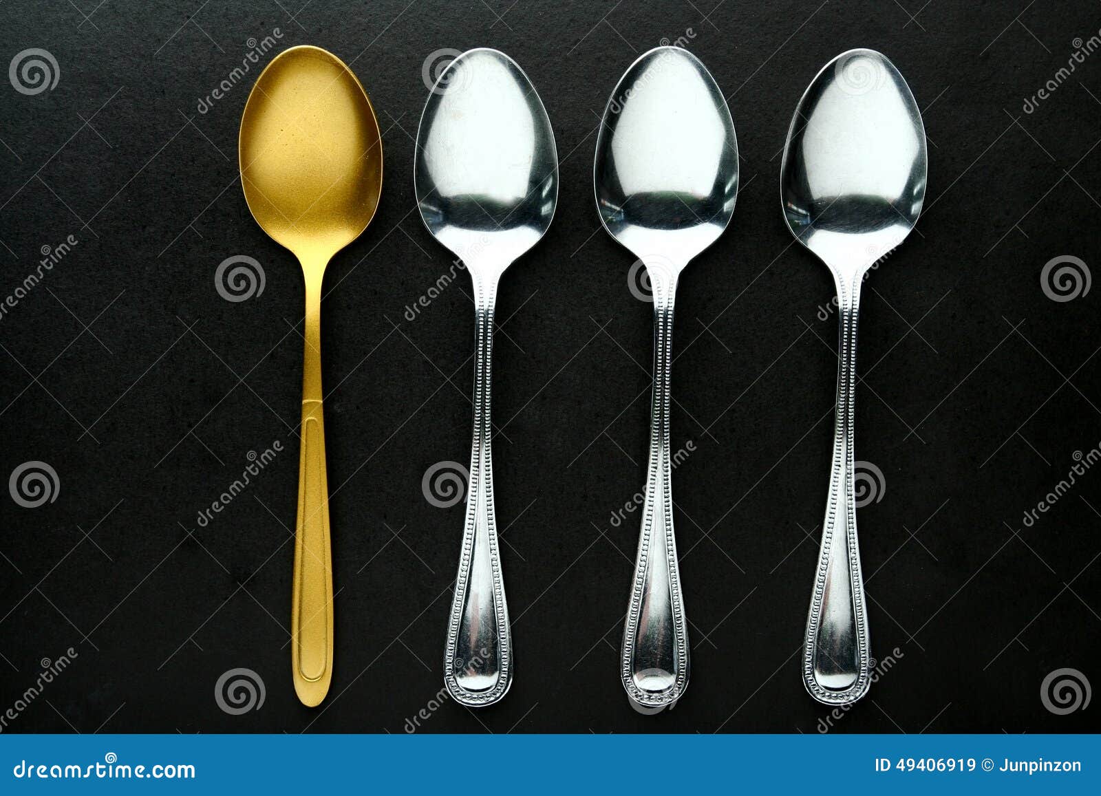 Golden Spoon among Ordinary Spoons Stock Image - Image of metal, shine ...