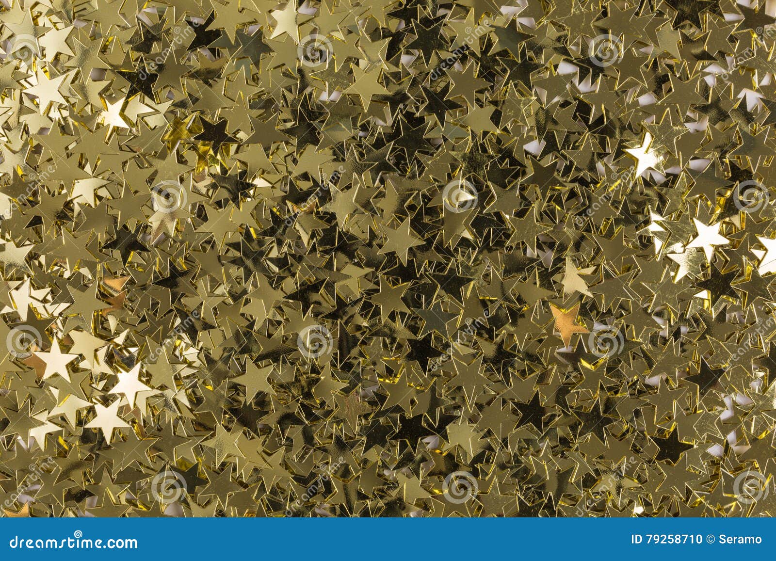 Golden star shaped sequins stock photo. Image of shine - 79258710