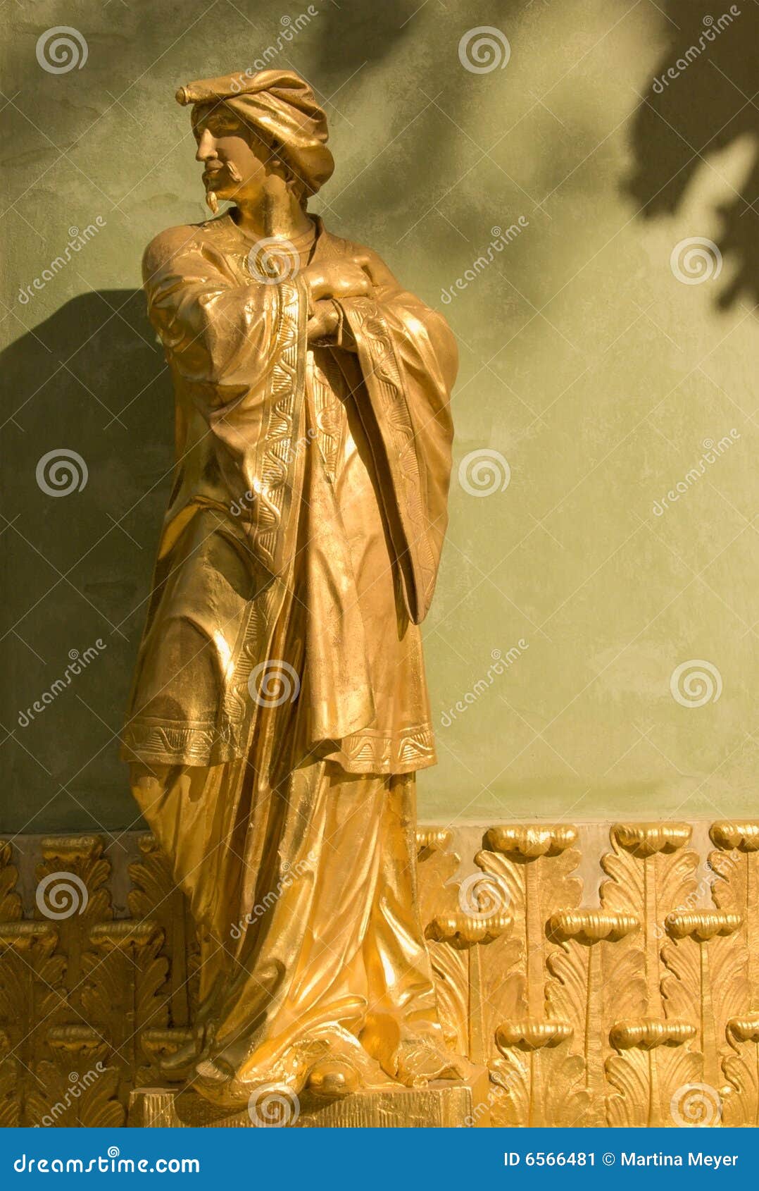 Golden Statue of an Oriental Man Stock Image - Image of chinese, ornate ...