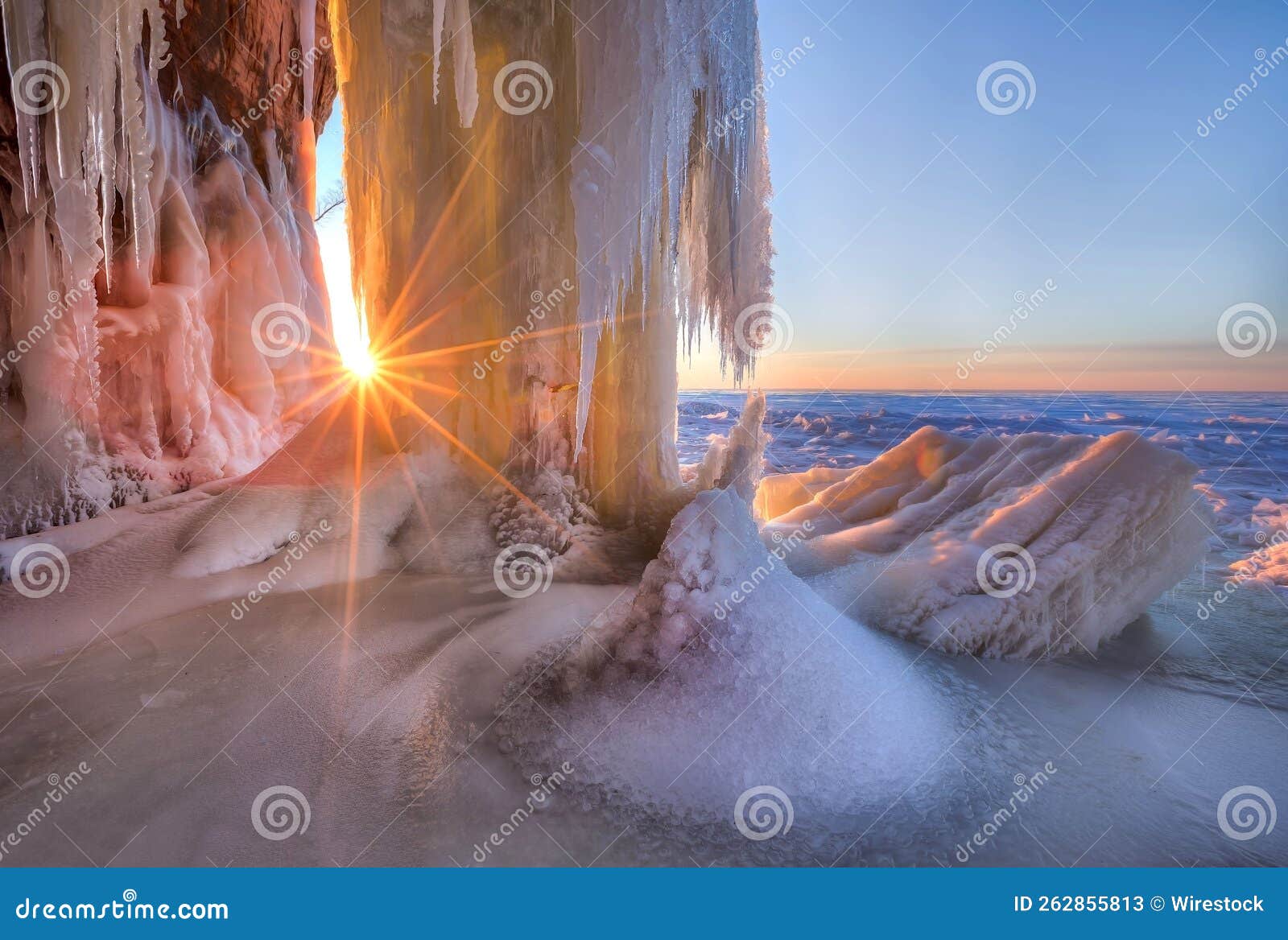 Golden Sun Rays Shining through the Frozen Ice Stock Image - Image of ...