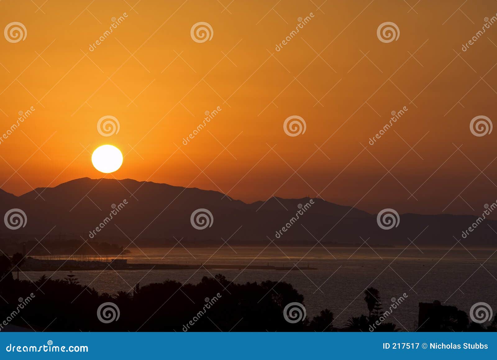 Golden Sunrise Over Port of Marbella Stock Image - Image of glow ...