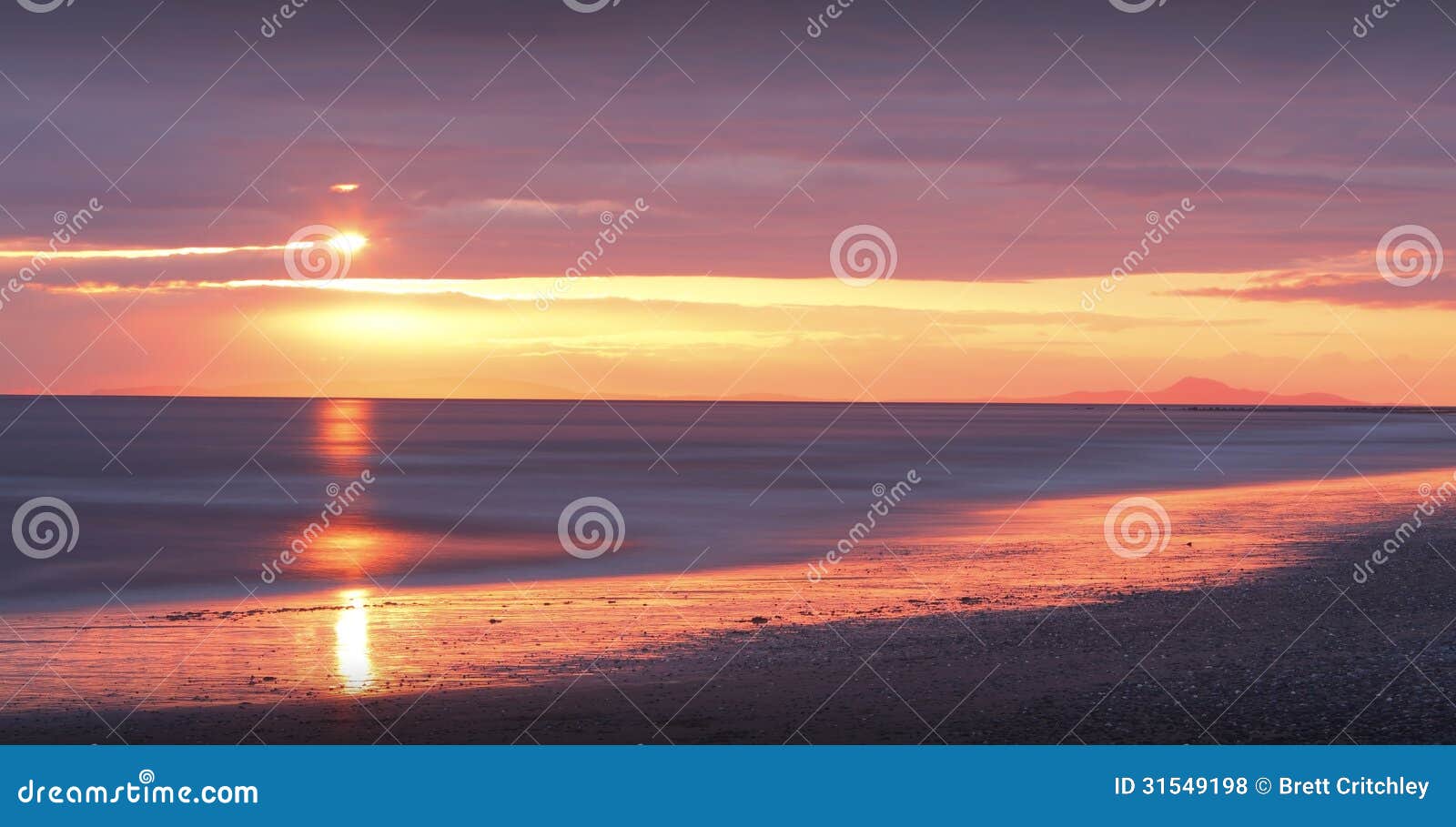 Golden sunset on beach stock photo. Image of shoreline - 31549198
