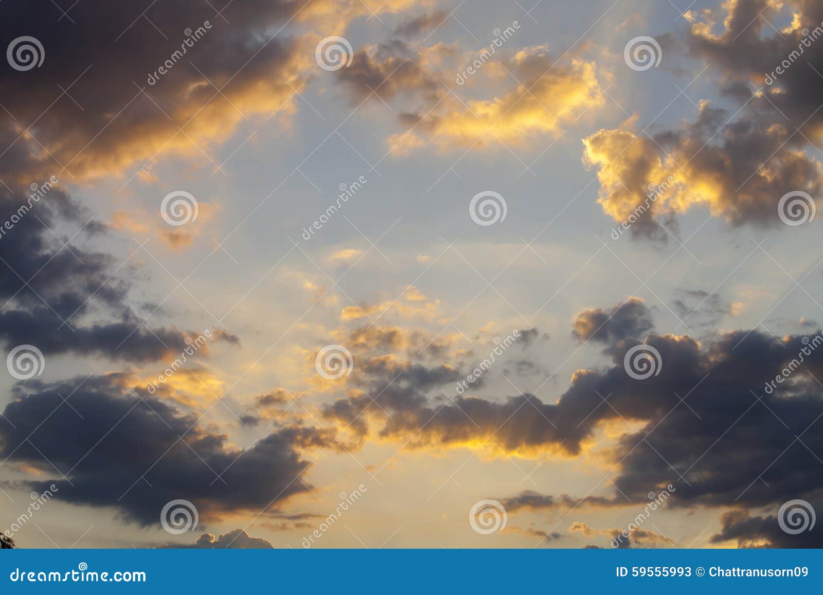 Golden Sunset through Clouds Over Dramatic Sky Stock Image - Image of ...