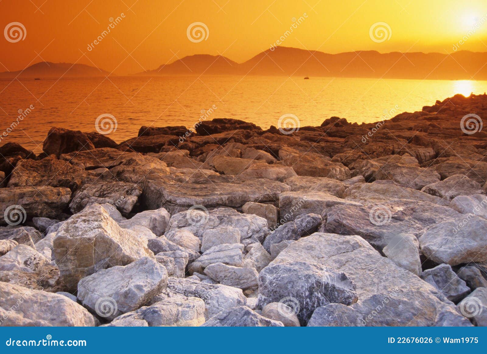 Golden sunset over rocks stock photo. Image of landscape - 22676026