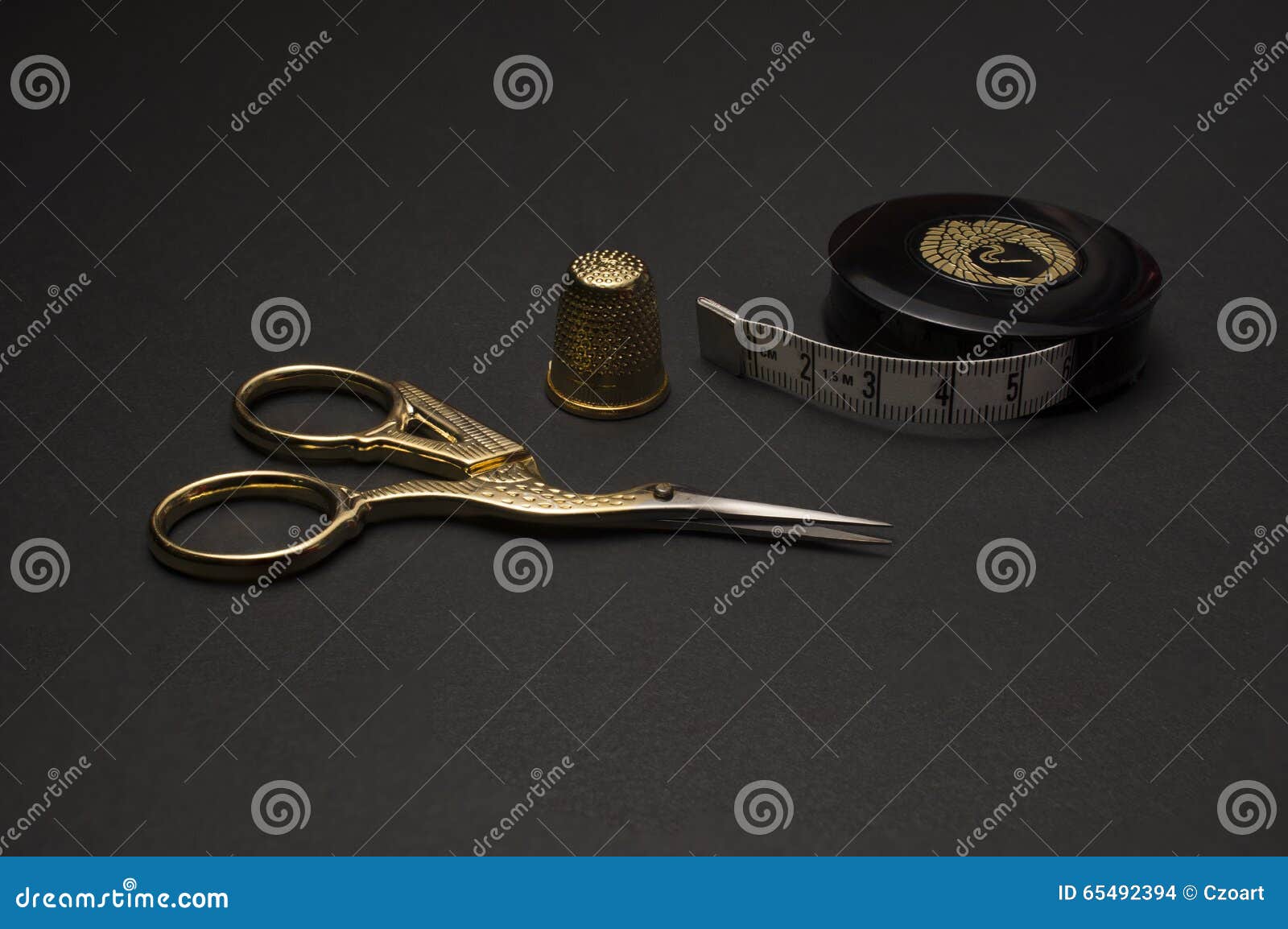 Golden tailoring utensils. stock photo. Image of abstract - 65492394