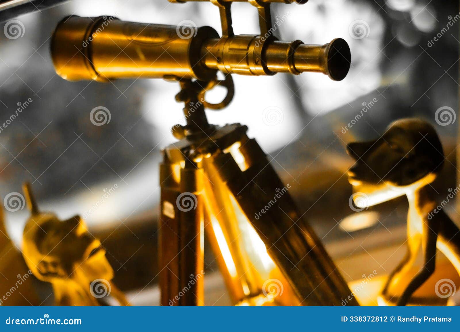 A Golden Telescope on Display Stock Photo - Image of light, wood: 338372812