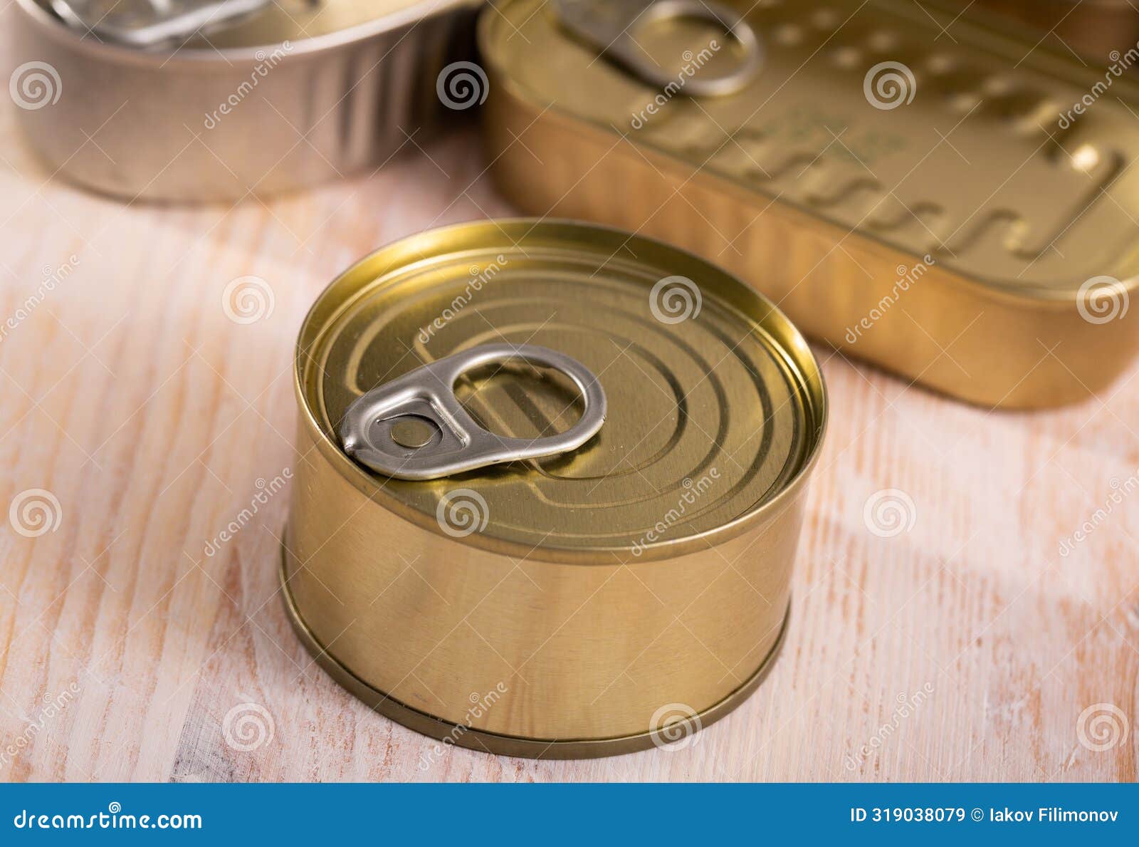 Golden tin can on table stock image. Image of golden - 319038079