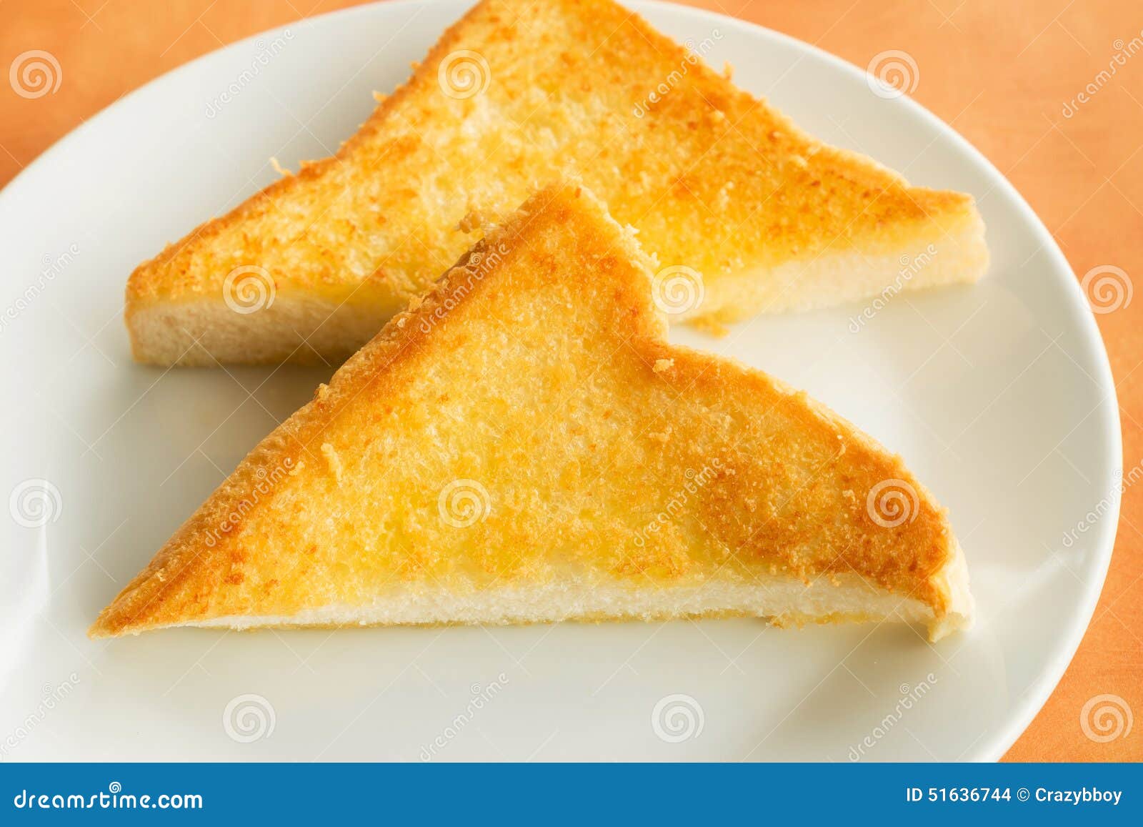 Golden Triangle Toast in the White Dish Stock Photo - Image of board ...